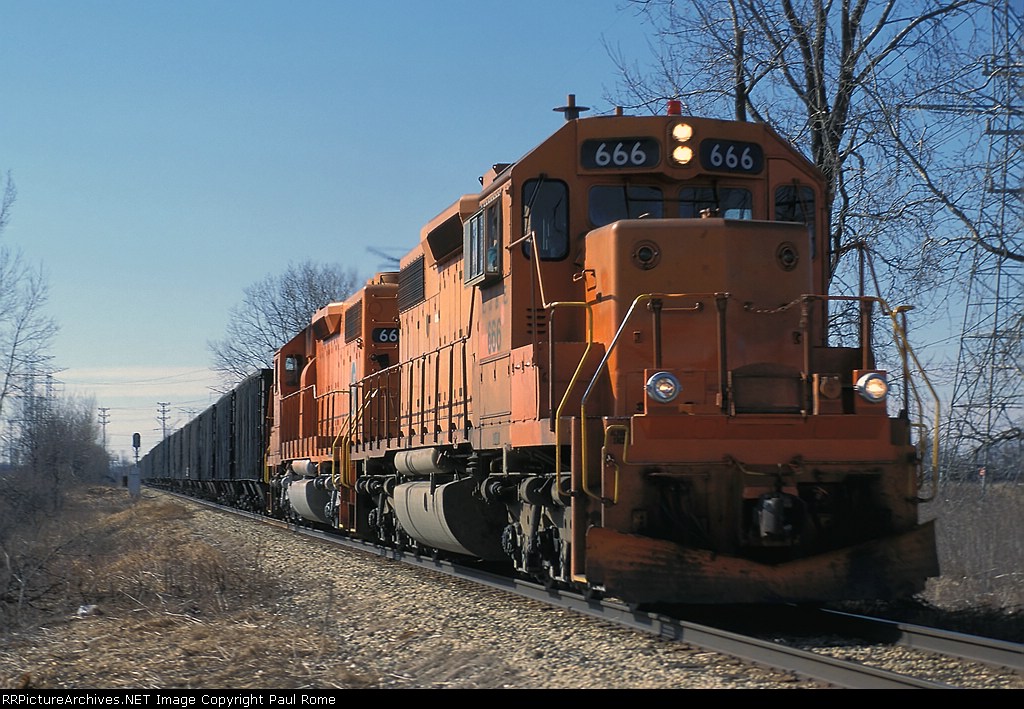 EJ&E 666 leads a northbound empty coal train